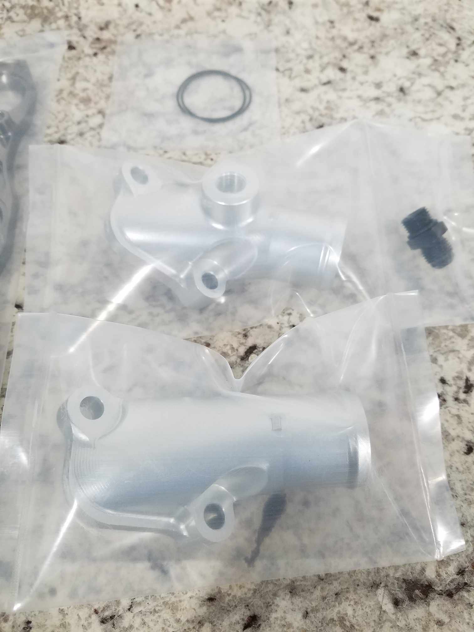 Supertec Racing RB26 Billet Water Outlet | OST Dyno